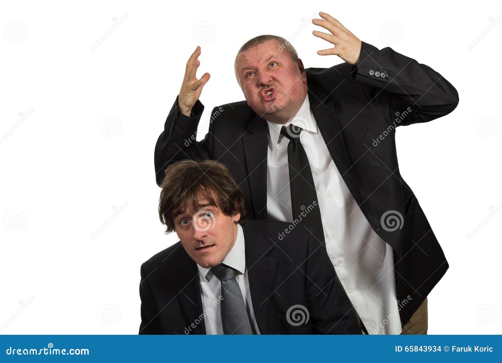 Businessman Screaming and Fighting at a Young Colleague Stock Photo ...