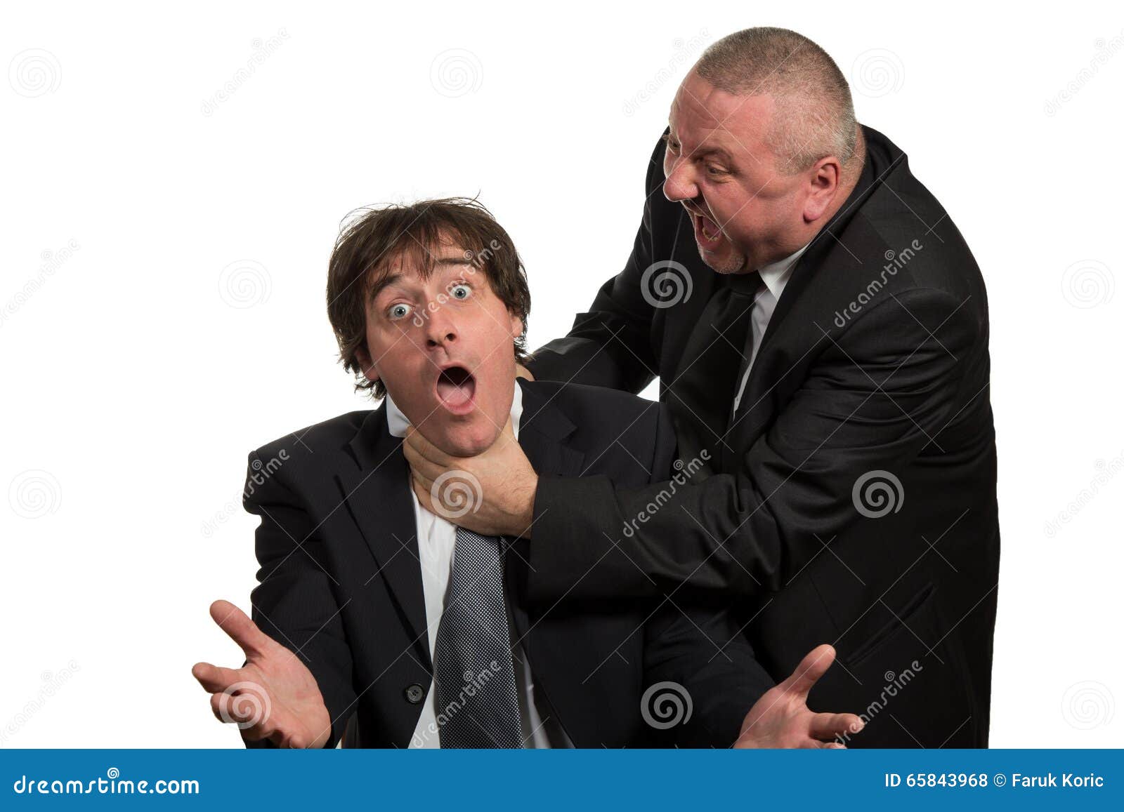 Businessman Screaming and Fighting at a Young Colleague Stock Photo ...