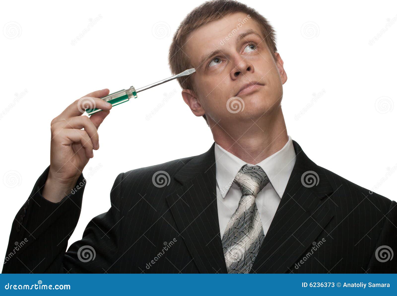 Businessman with a Screwdriver Thinking or Perplex Stock Image - Image ...