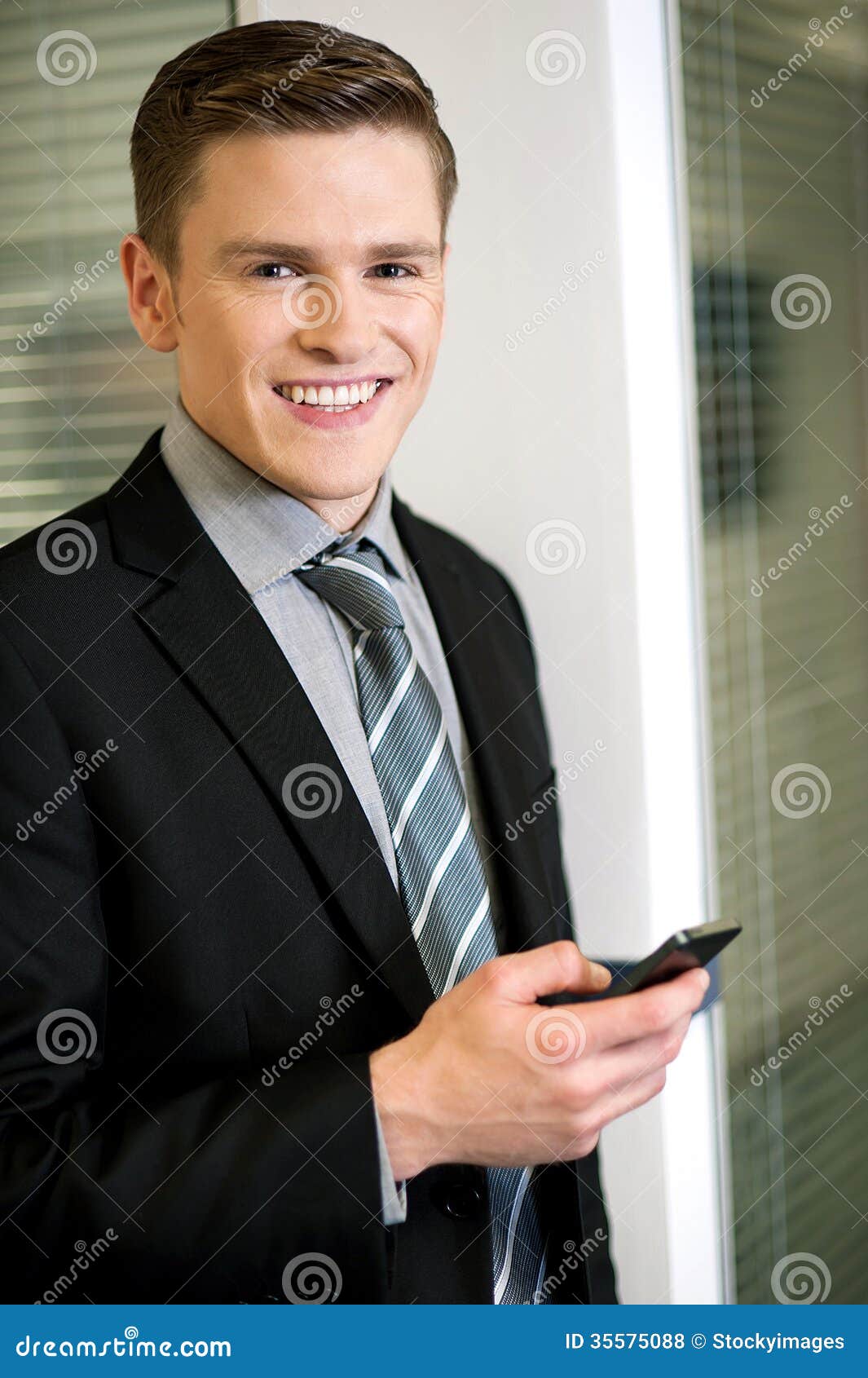 Businessman Sending Text Message Stock Photo - Image of cellphone ...