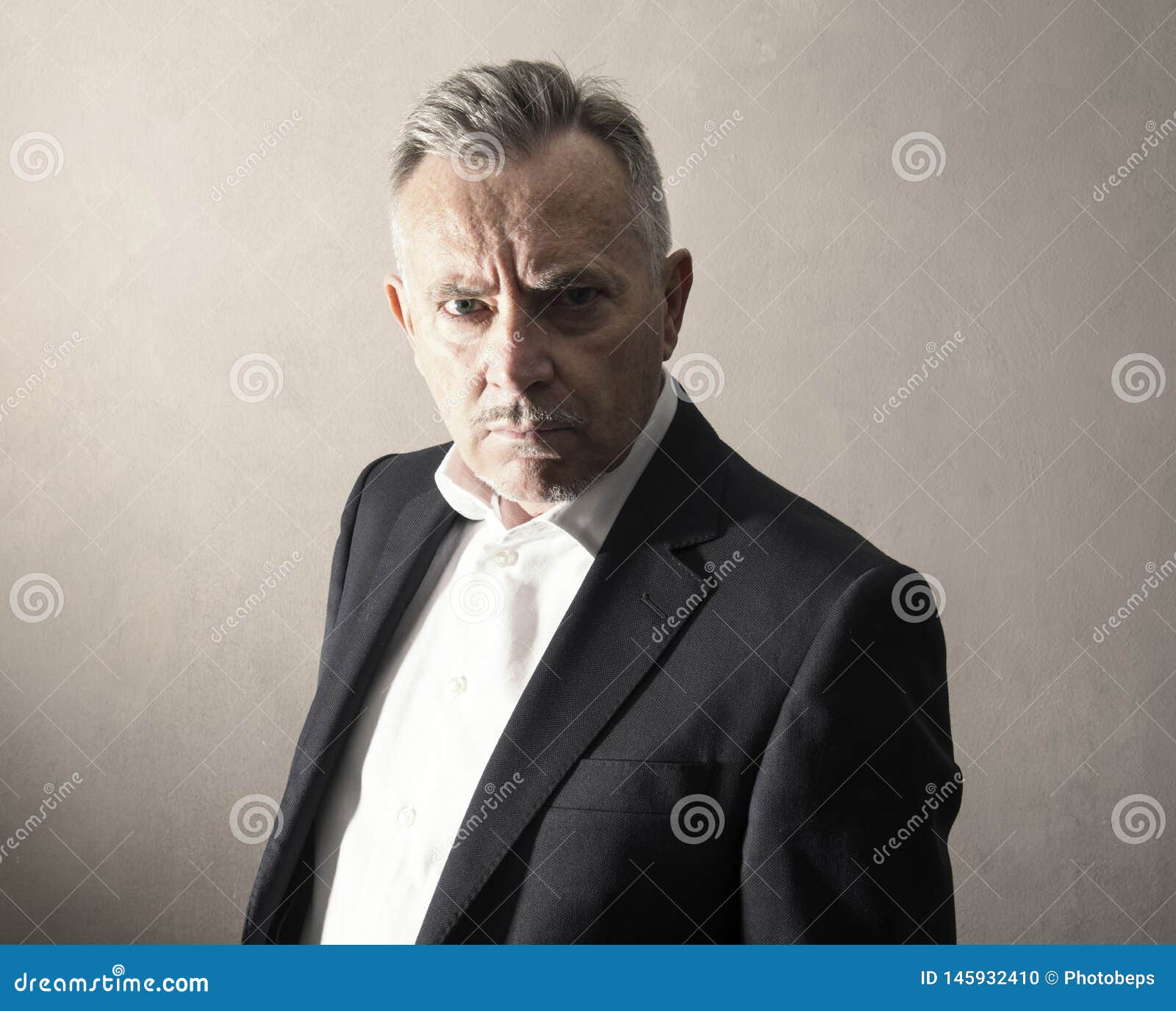 Businessman with Serious Look Stock Photo - Image of intense, success ...