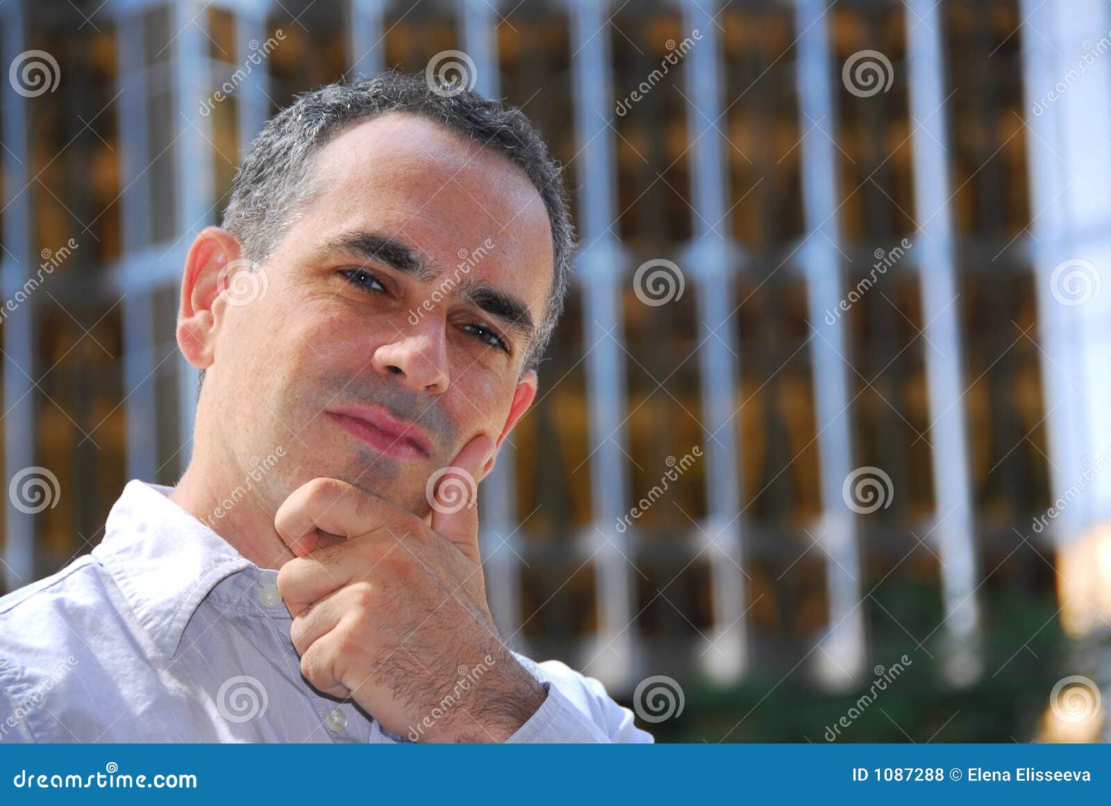 Businessman serious think stock photo. Image of building - 1087288