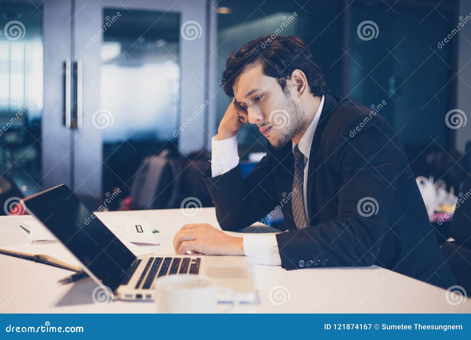 Businessman Serious about the Work Hard Done until the Headache Stock ...