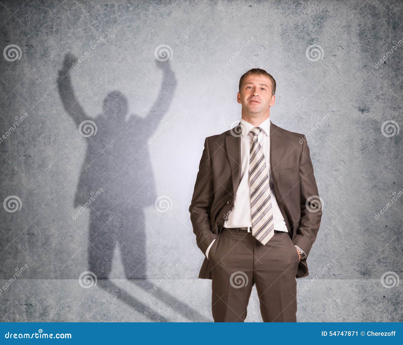 Businessman with Shadow Showing Win Stock Image - Image of grey, suit ...