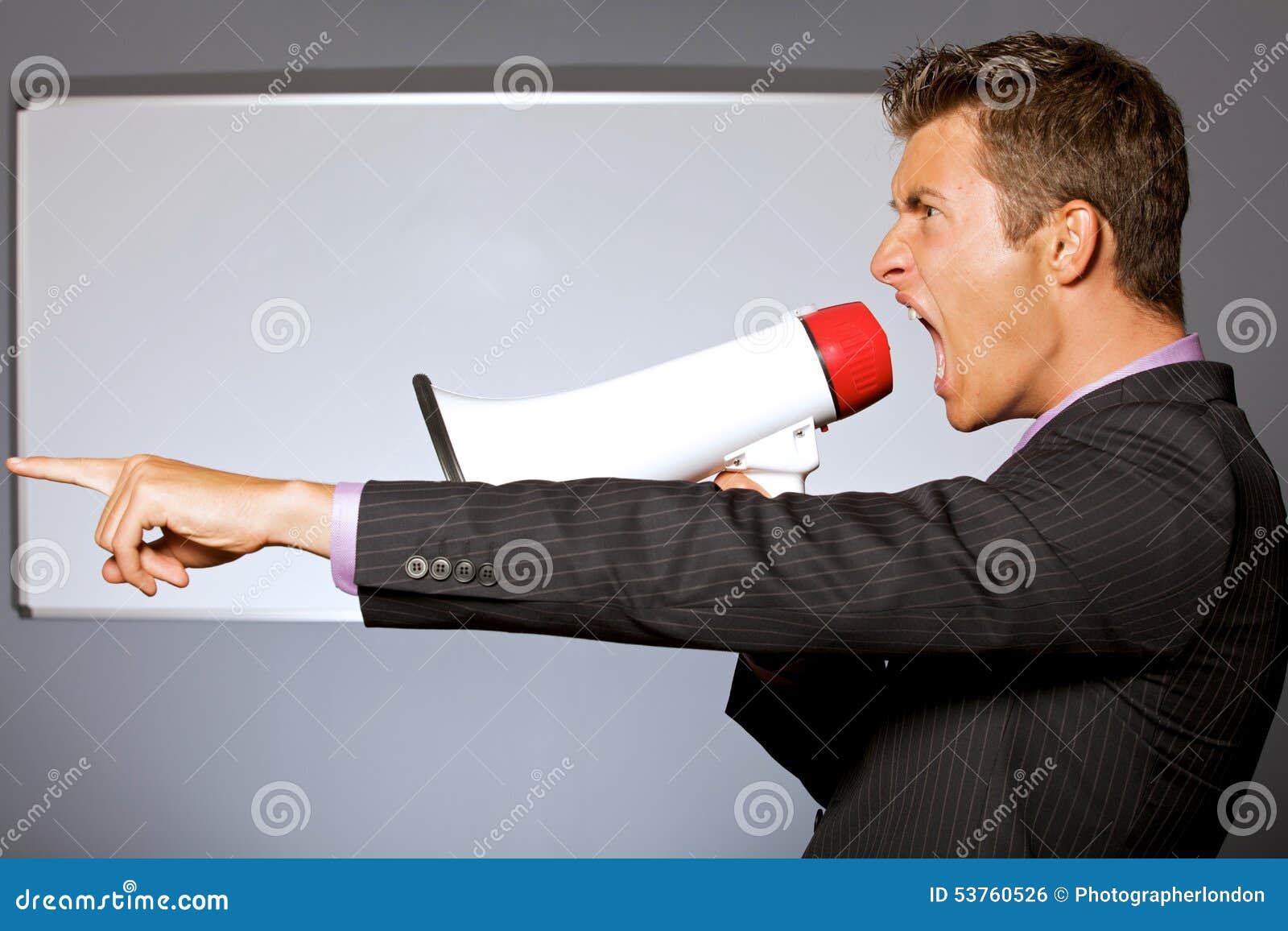 Businessman Shouting through Megaphone Stock Photo - Image of business ...