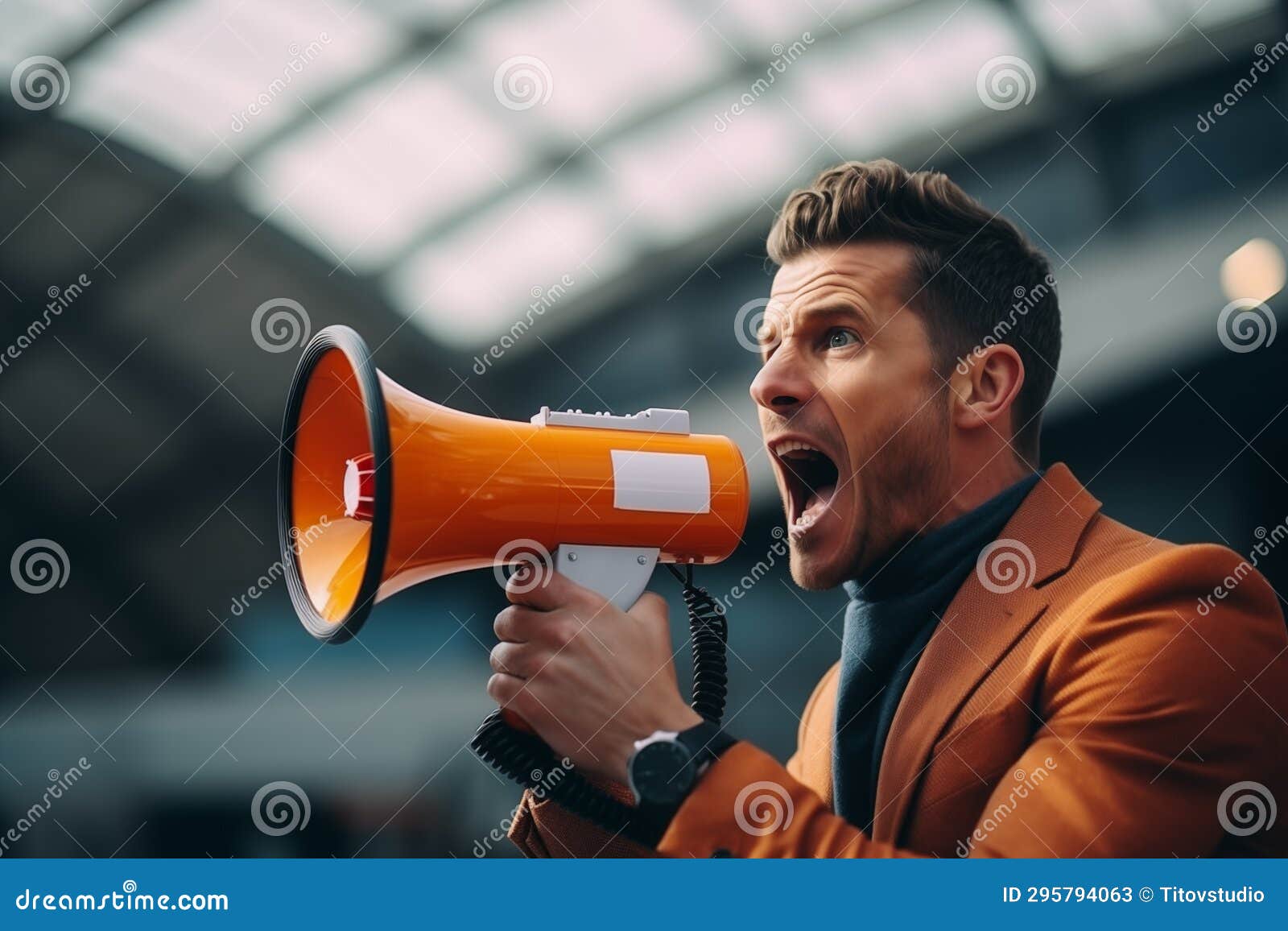 Businessman Shouting through a Megaphone Outside in Front of Office ...