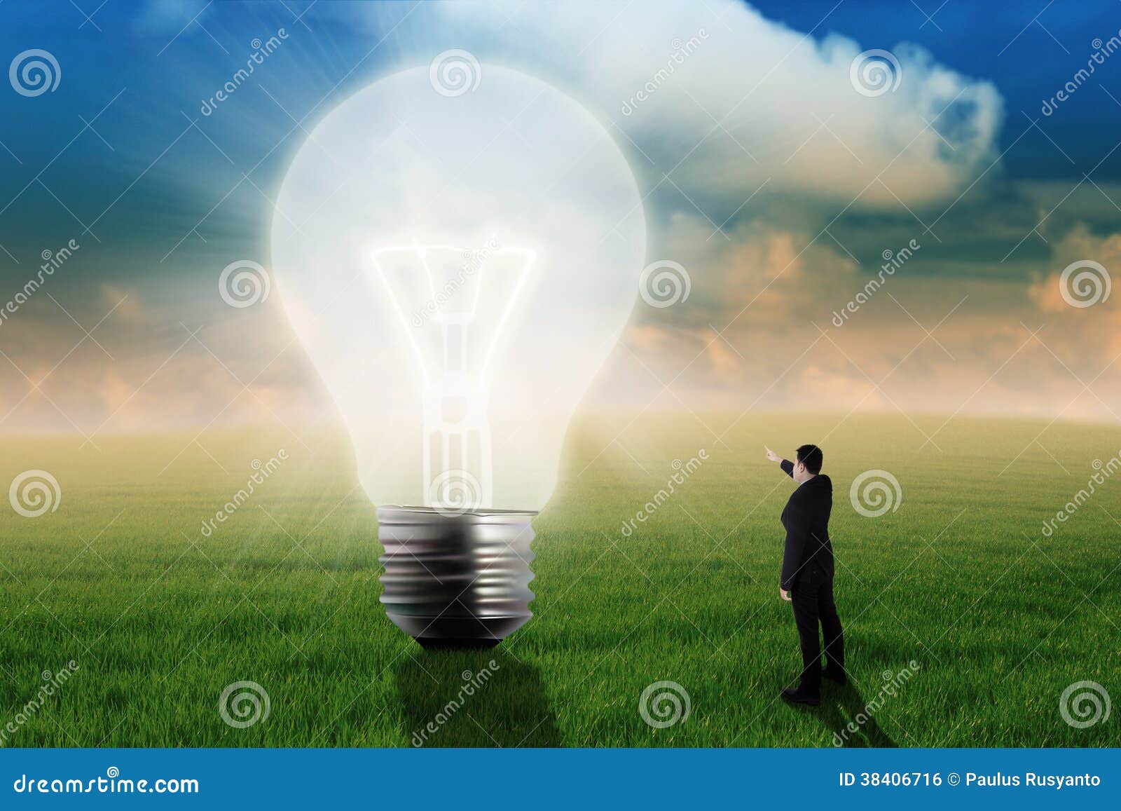 Businessman Showing Big Light Bulb Stock Photo - Image of lightbulb ...