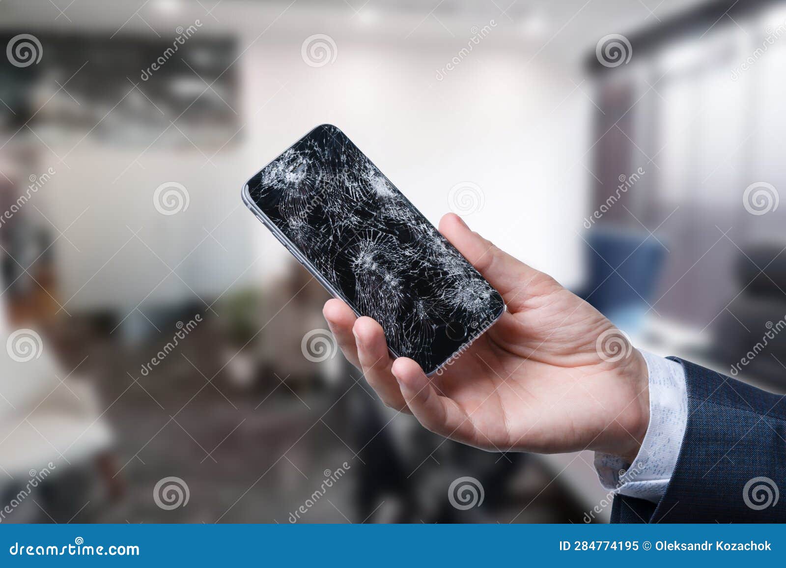 Businessman Showing Broken Smartphone with Crashed Screen. Stock Image ...