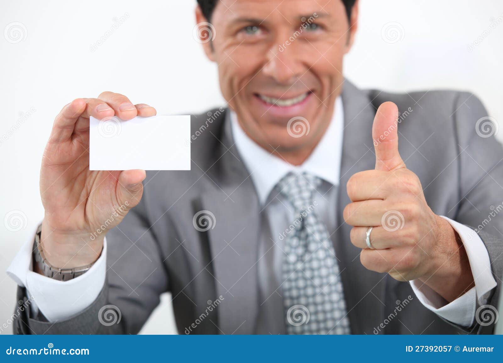 Businessman showing card stock image. Image of elegant - 27392057