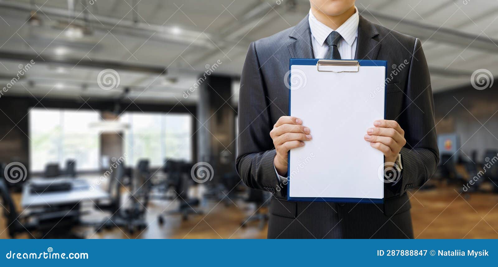 Businessman Showing Checklist or Blank Form Against Stock Image - Image ...