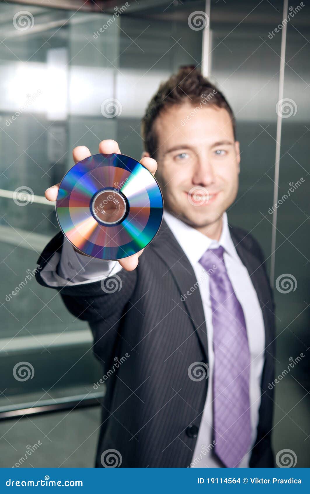 Businessman showing disk stock photo. Image of businessman - 19114564
