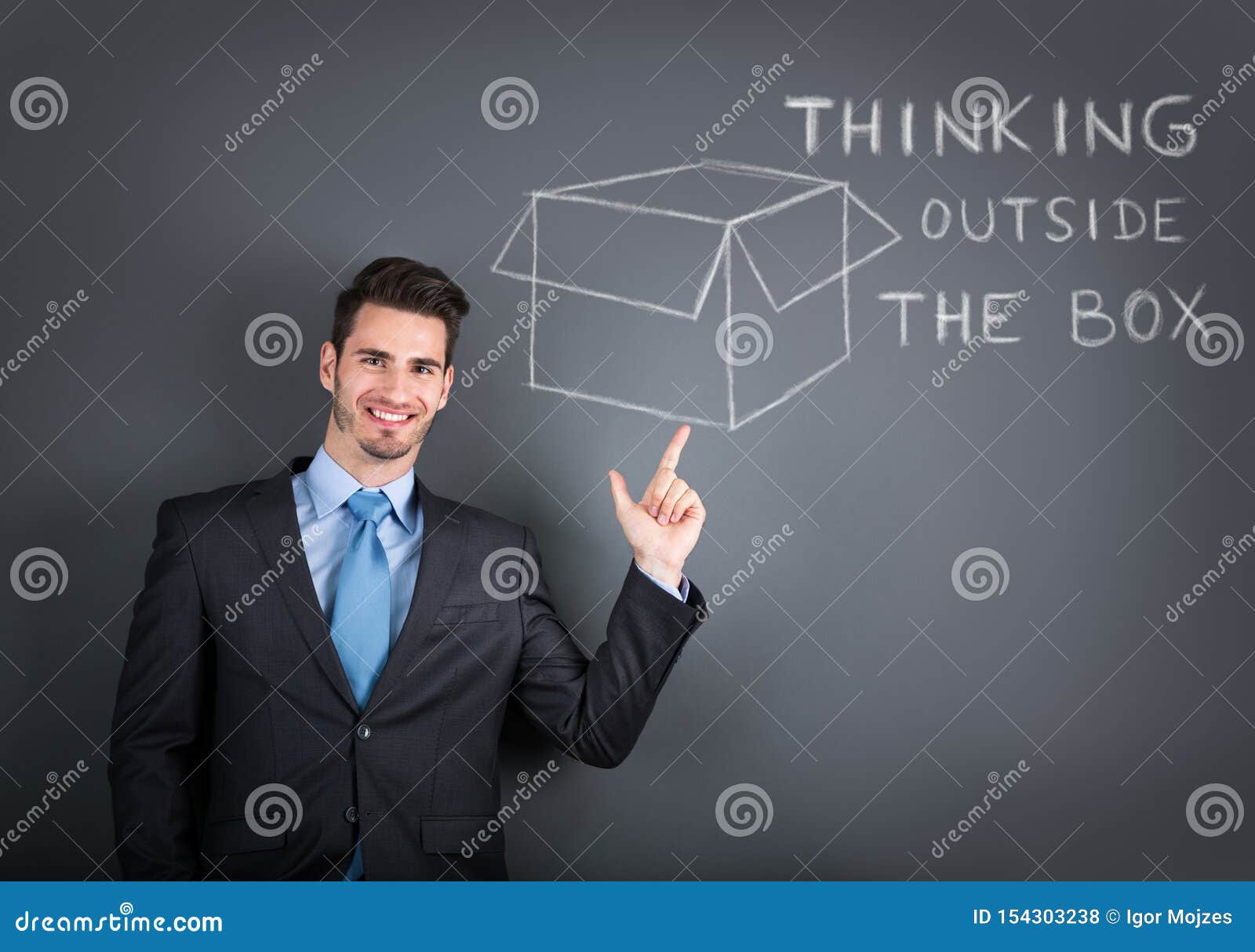 Businessman Showing a Drawing of Think Out of the Box Stock Photo ...