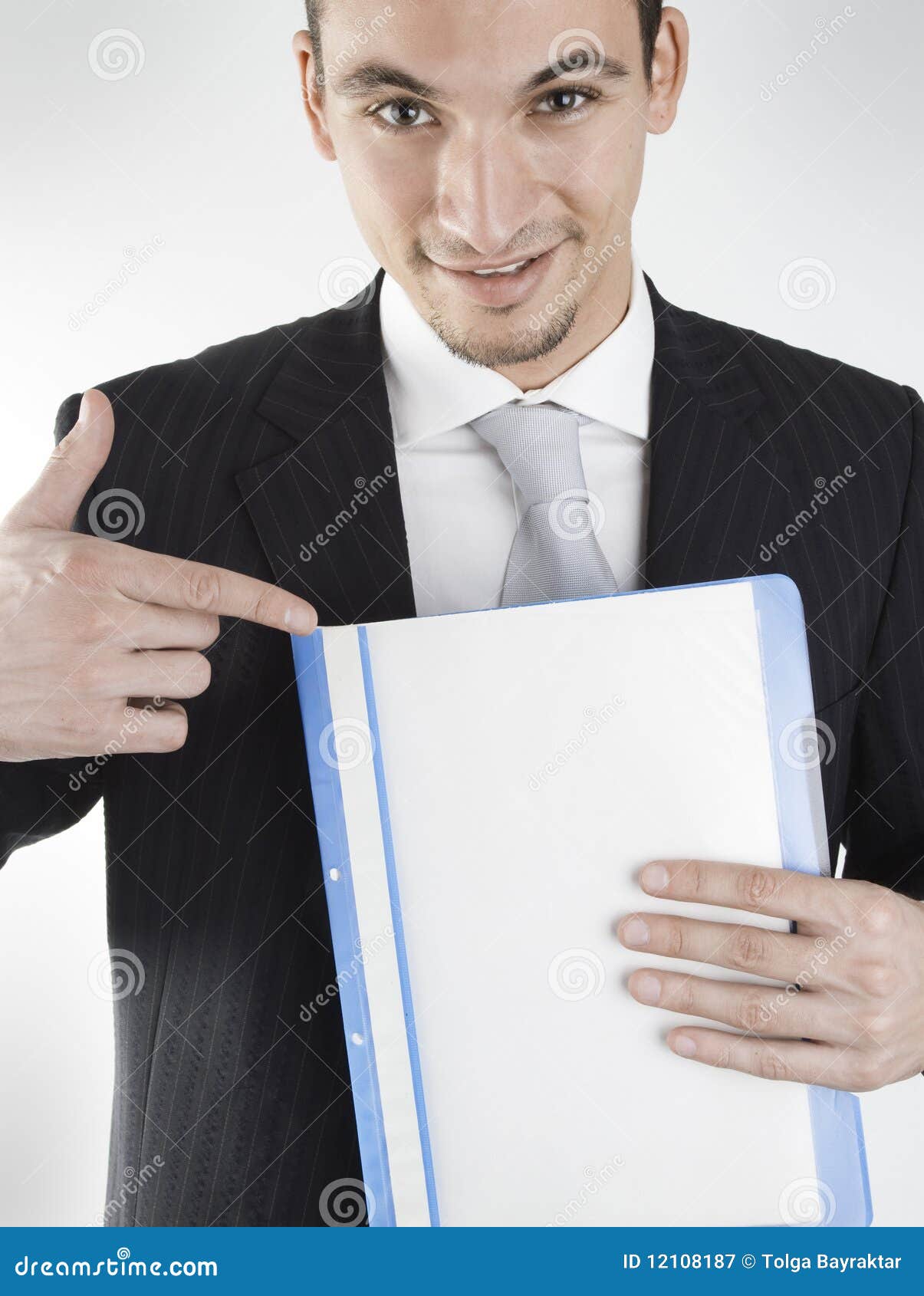 Businessman showing folder stock image. Image of expressing - 12108187