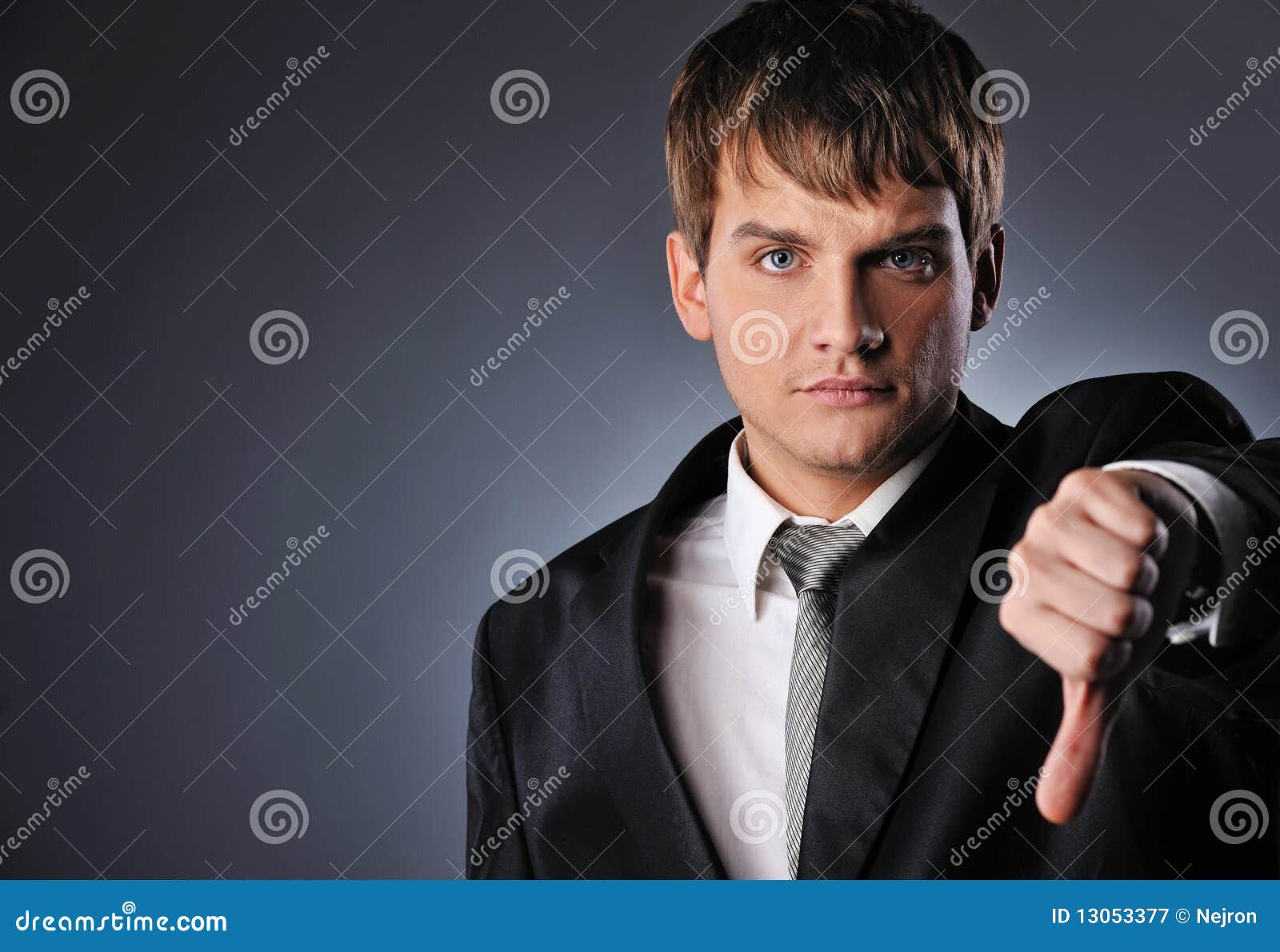 Businessman Showing His Thumb Down Stock Image - Image of handsome ...