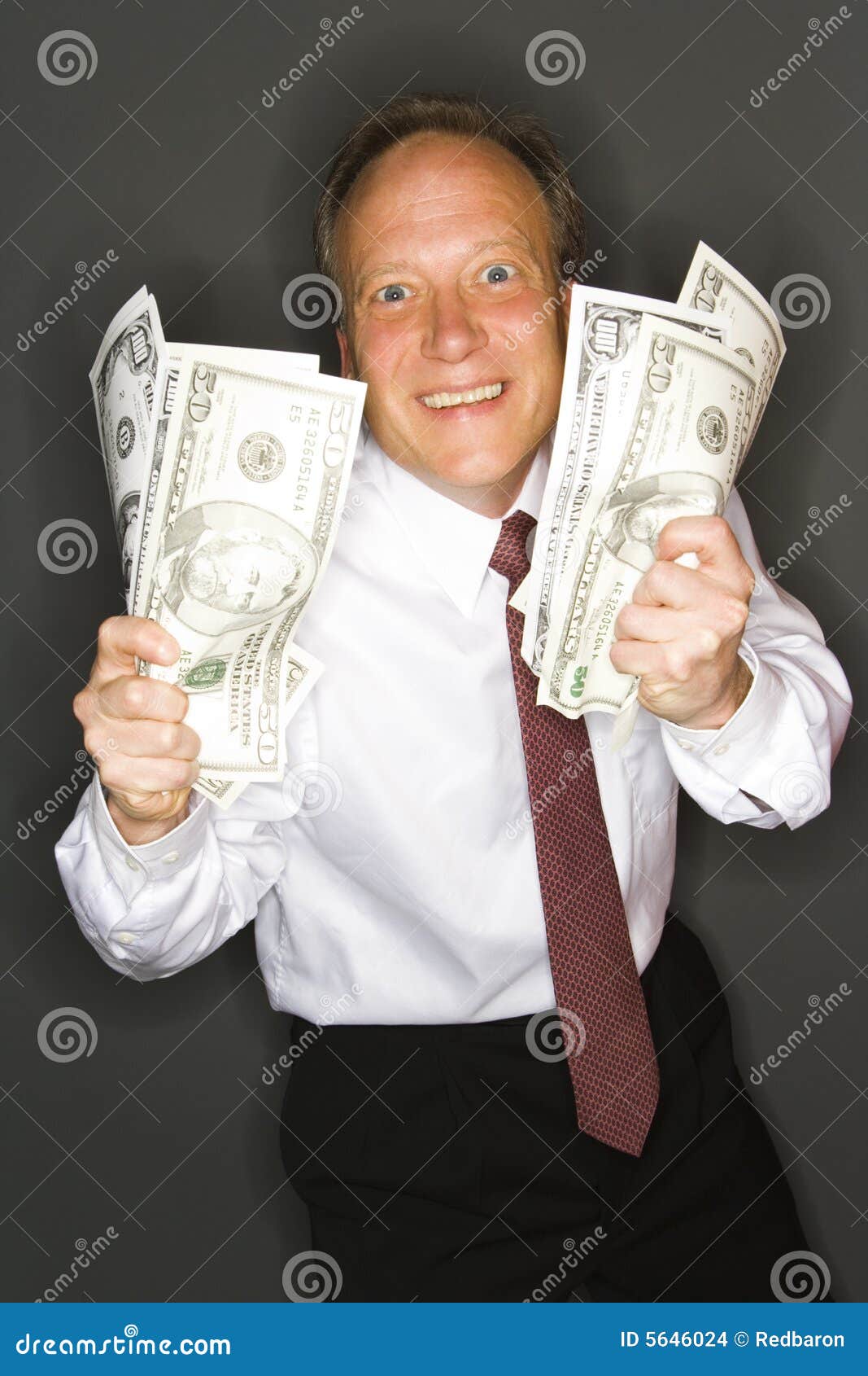 Businessman Showing Profits Stock Photo - Image of executive, greedy ...