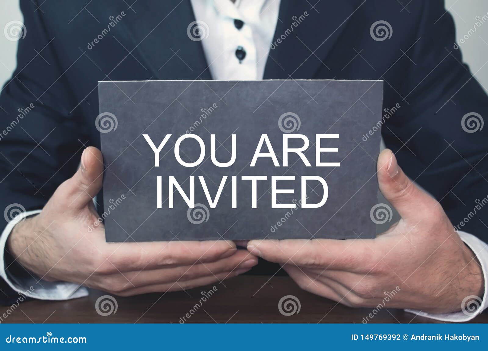 Businessman Showing You are Invited Text Stock Photo - Image of text ...