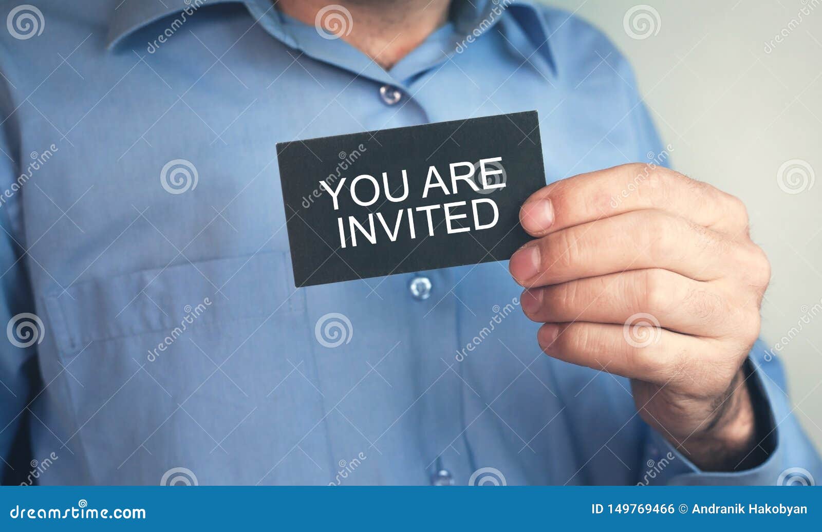 Businessman Showing You are Invited Text Stock Photo - Image of ...