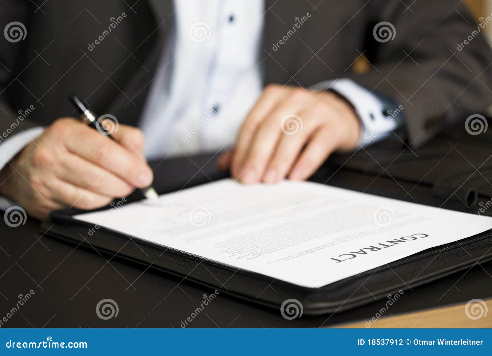 Businessman Signing a Contract. Stock Photo - Image of businessman ...