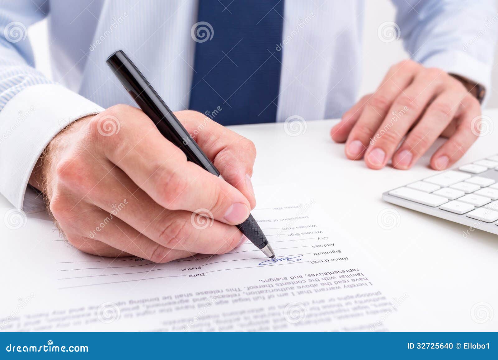 Businessman Signing a Document. Stock Photo - Image of filling, note ...