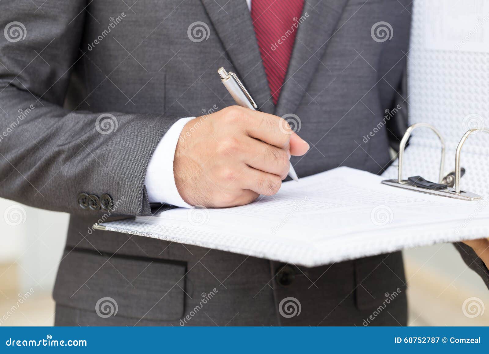 Businessman Signing a Document Stock Image - Image of paperwork ...