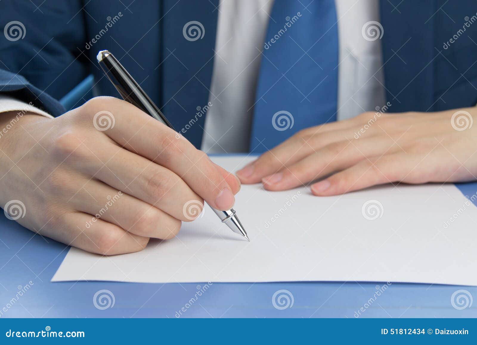 Signing Of Documents For Permits, Consent. Hands Hold A Pen Over Paper ...