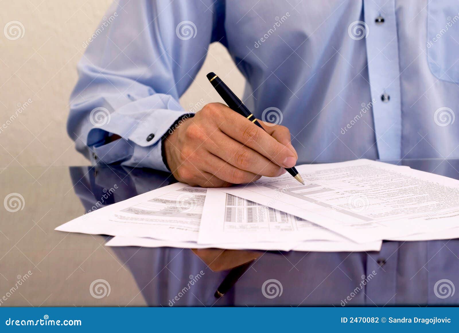 Businessman signing papers stock photo. Image of language - 2470082