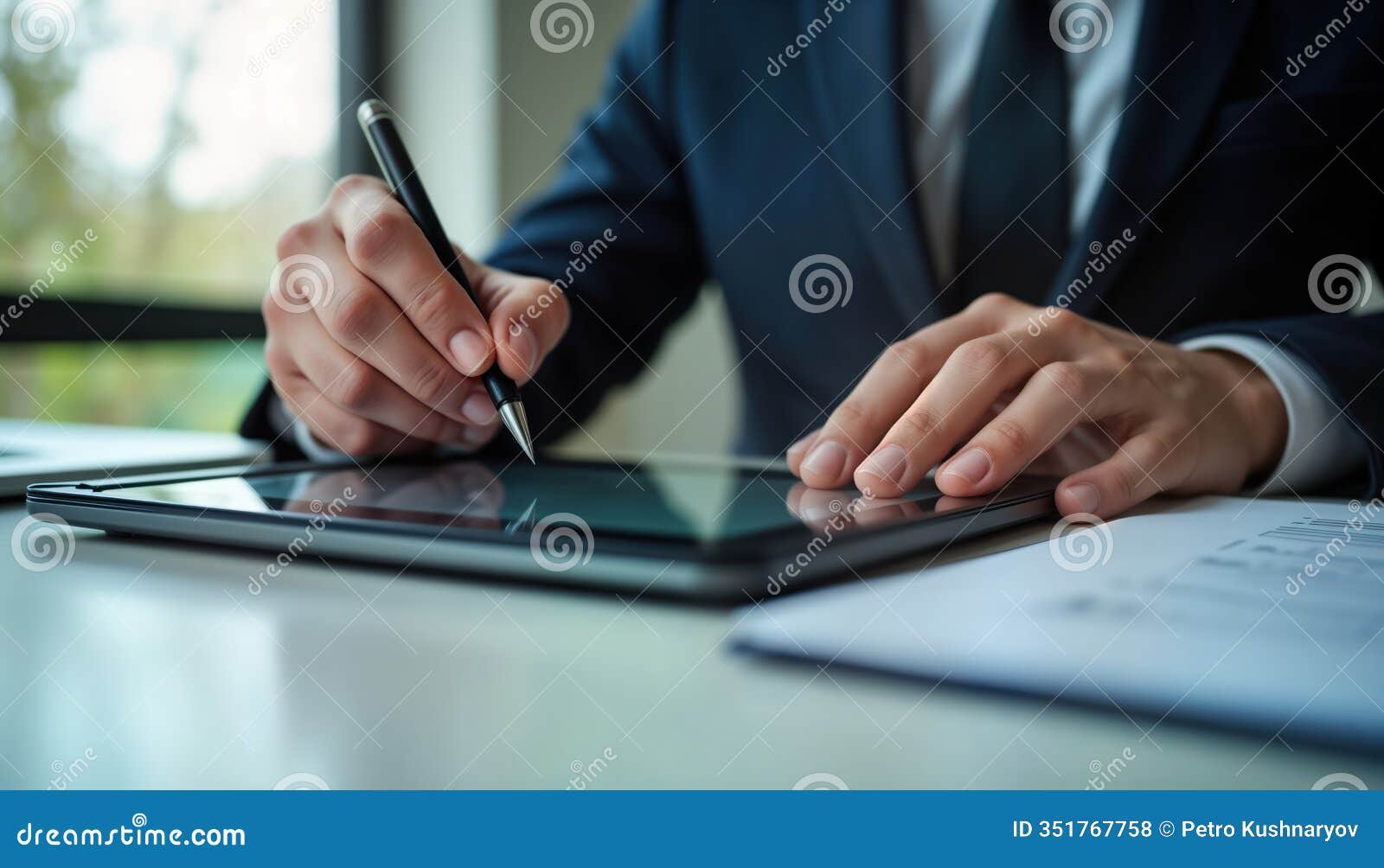 Businessman Signs Digital Contract on Tablet. Man in Suit Uses Tech ...