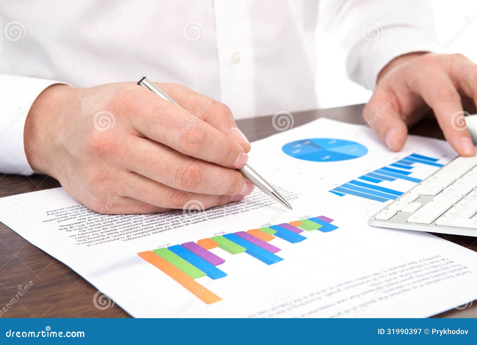 Businessman Signs a Document at the Desk in the Office Stock Image ...