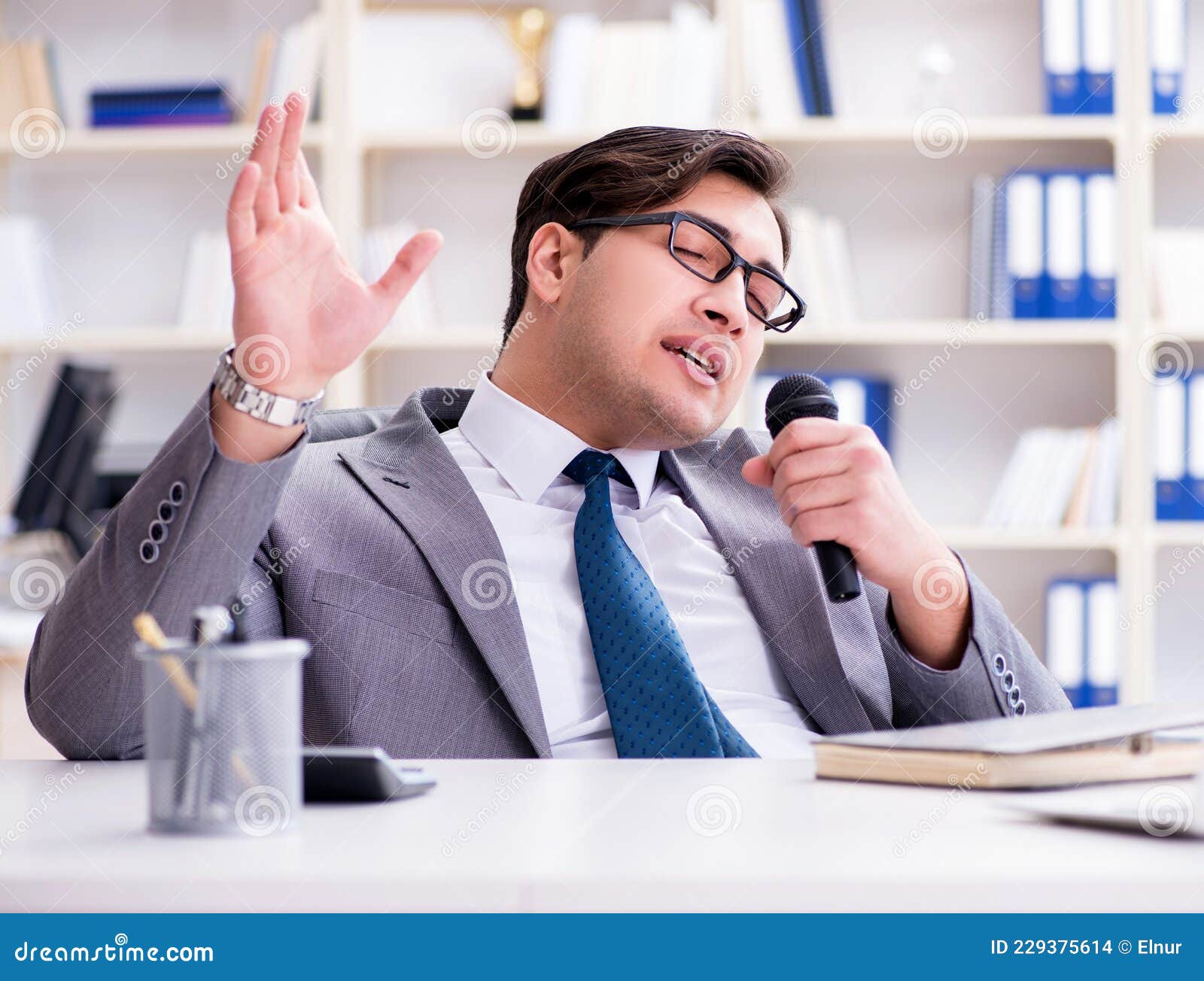 Businessman Singing in the Office Stock Photo - Image of busy, business ...