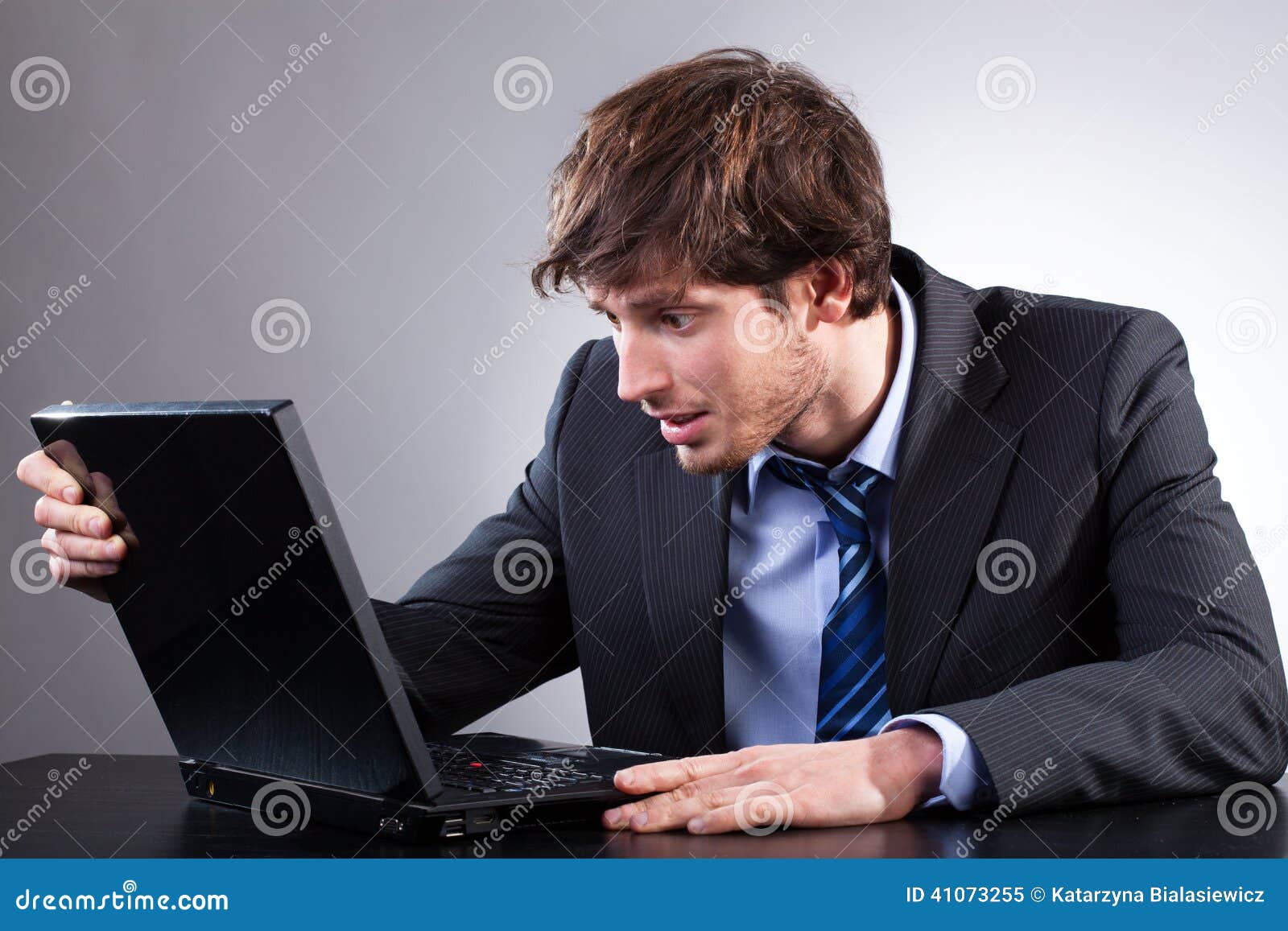 Businessman Siting at His Desk and Looking at Computer Stock Image ...
