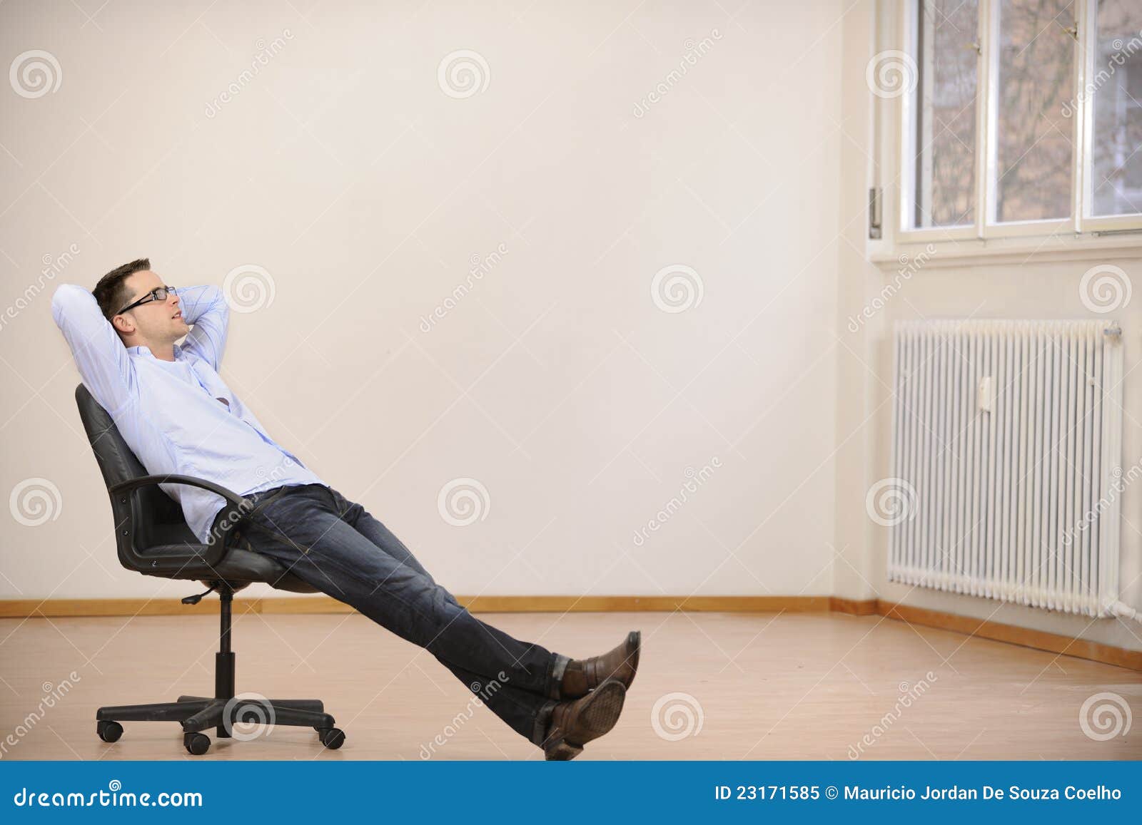 Businessman Sitting Alone in New New Office Stock Image - Image of ...