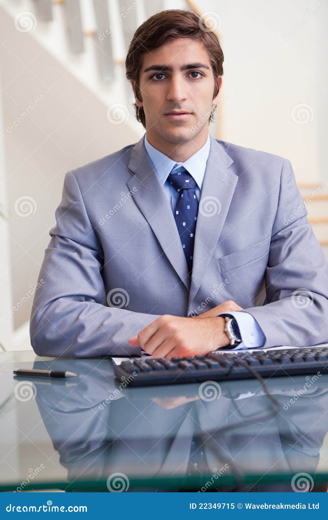 Businessman Sitting Behind His Desk Stock Image - Image of interior ...