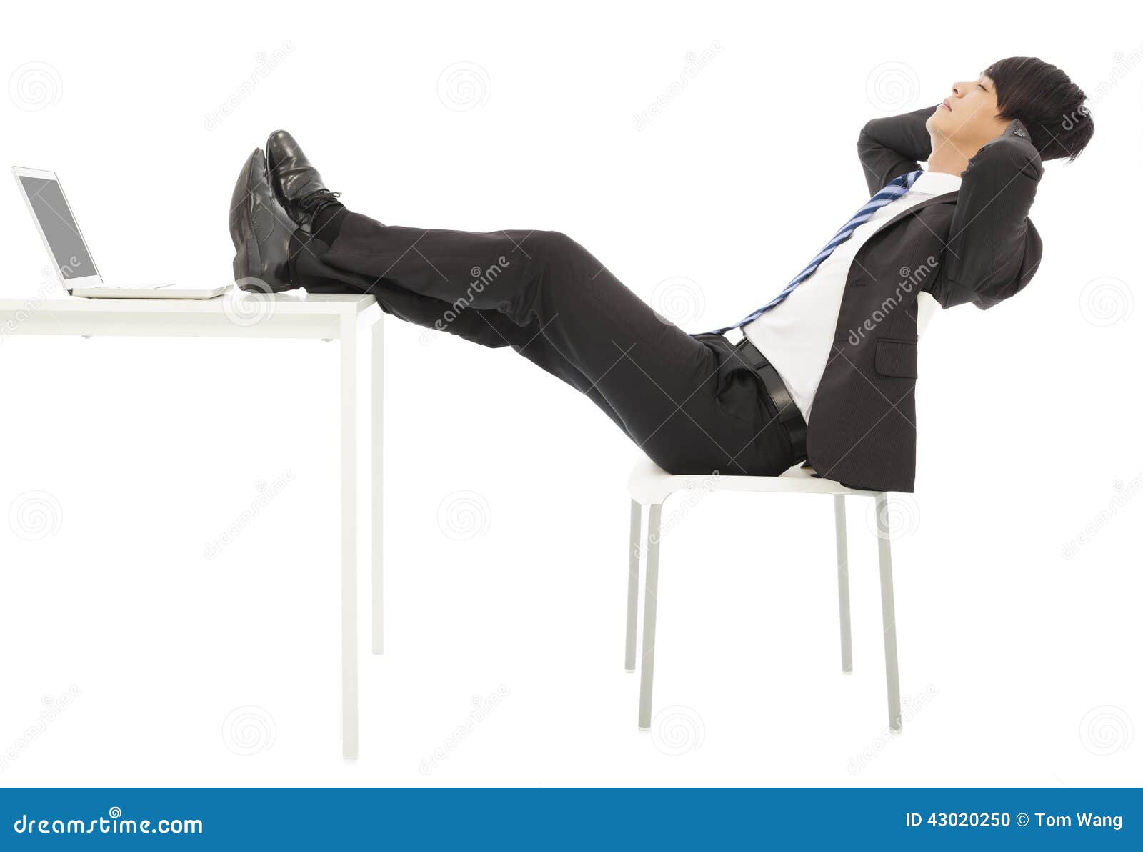 Businessman Sitting on a Chair To Take a Rest Stock Photo - Image of ...