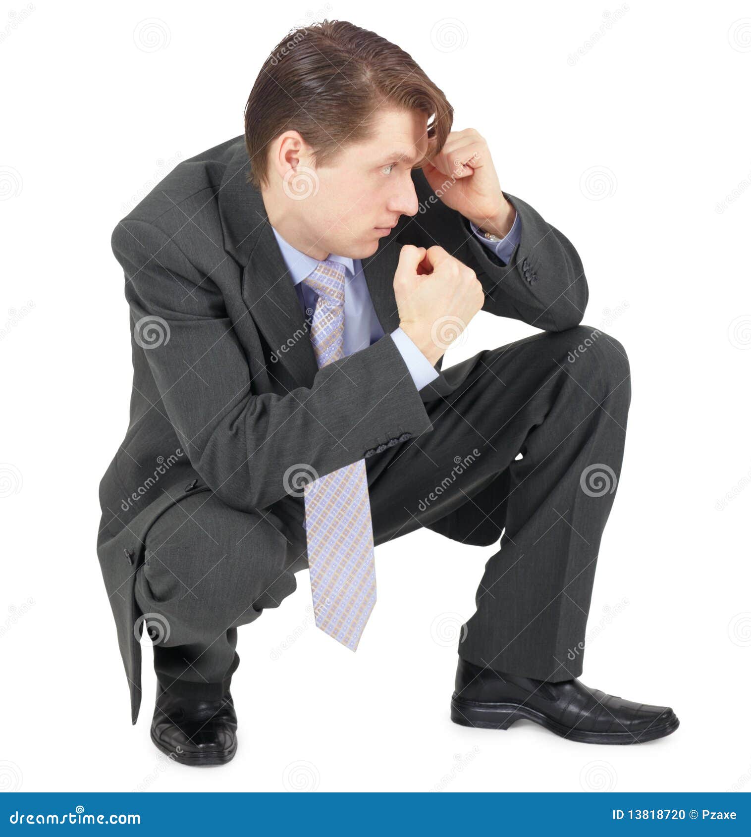 Businessman Sitting in Defensive Pose Stock Photo - Image of black ...