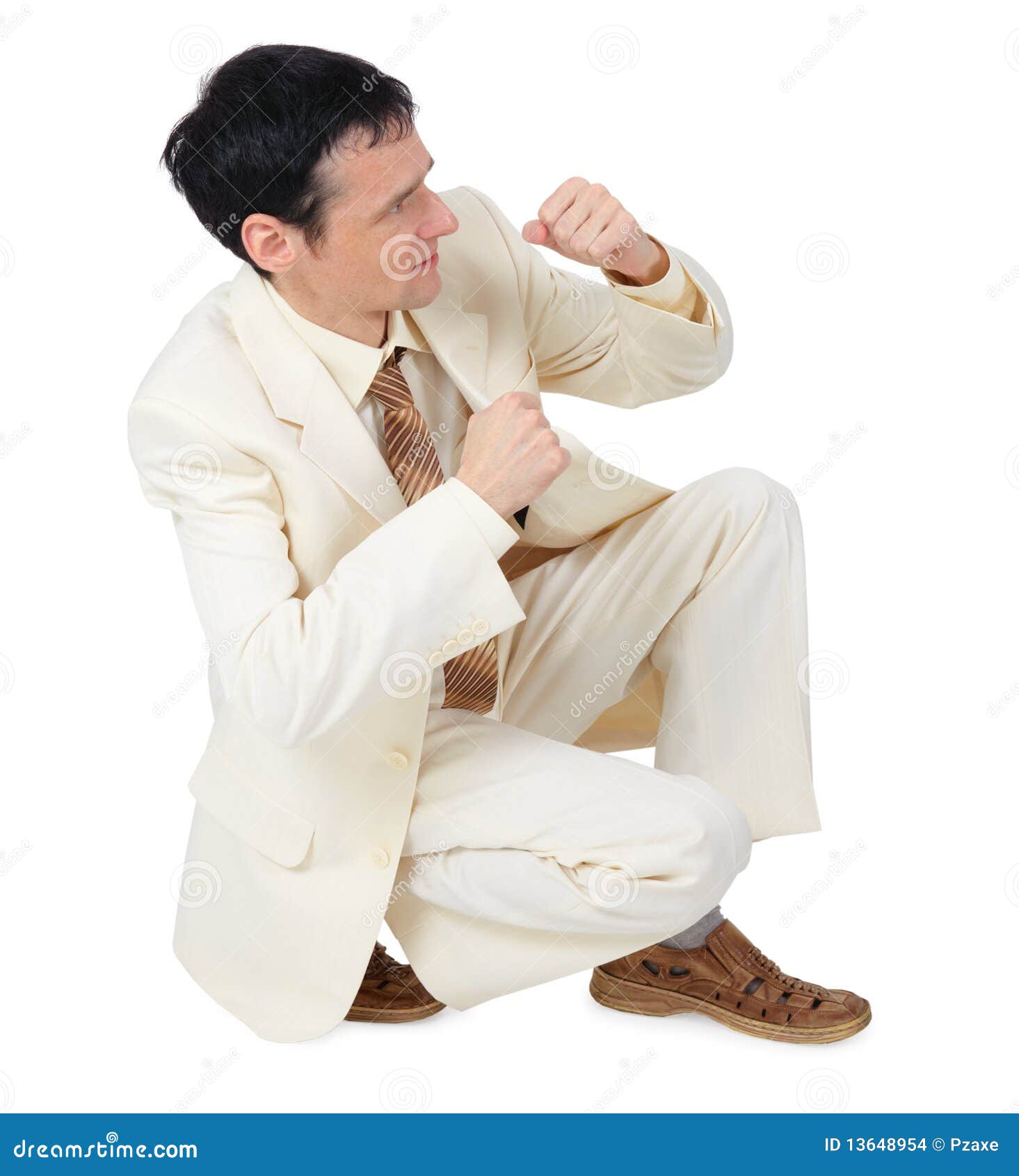 Businessman Sitting in Defensive Posture Stock Photo - Image of ...