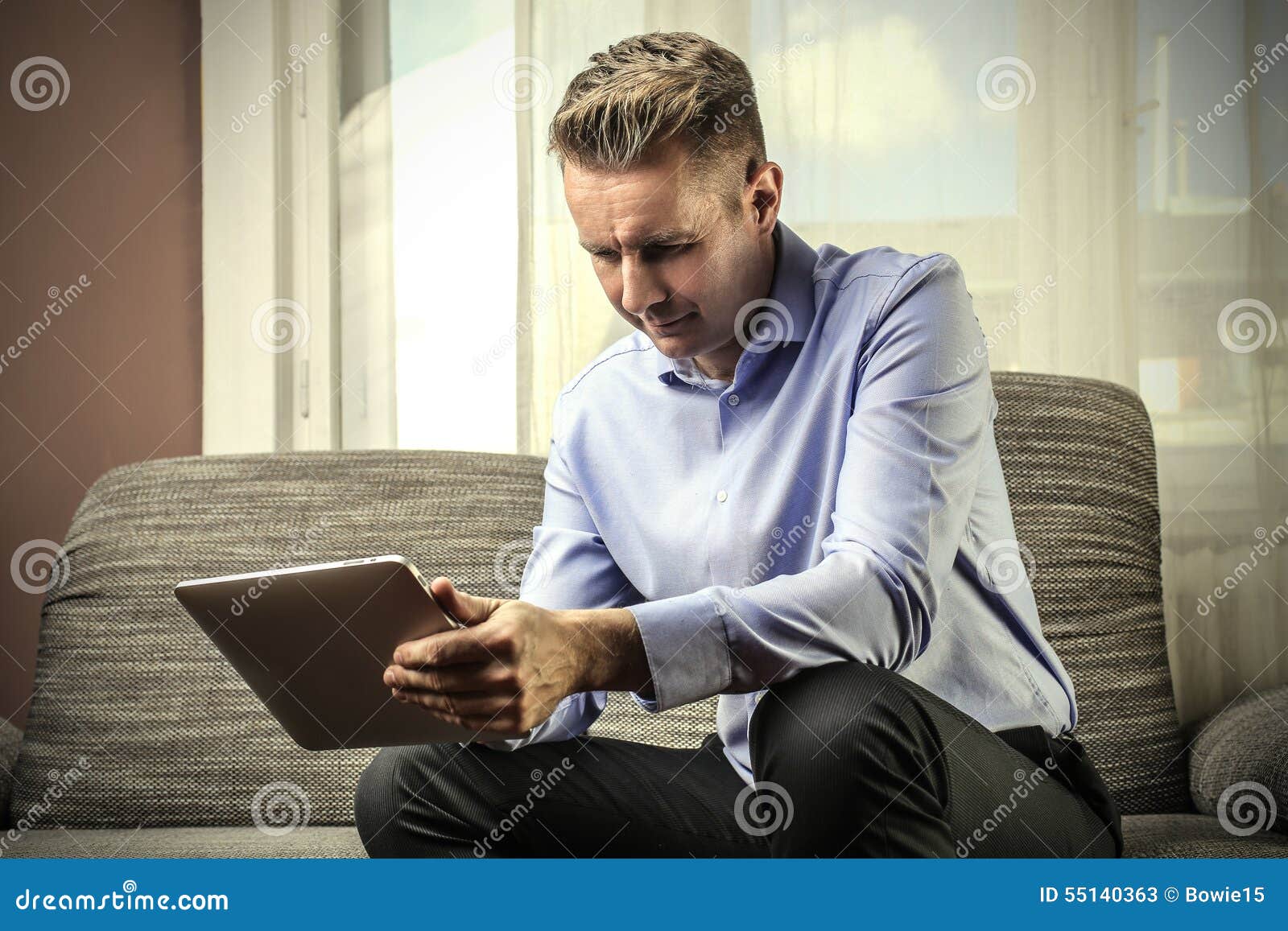 Businessman Sitting Indoors Stock Image - Image of lounge, divan: 55140363