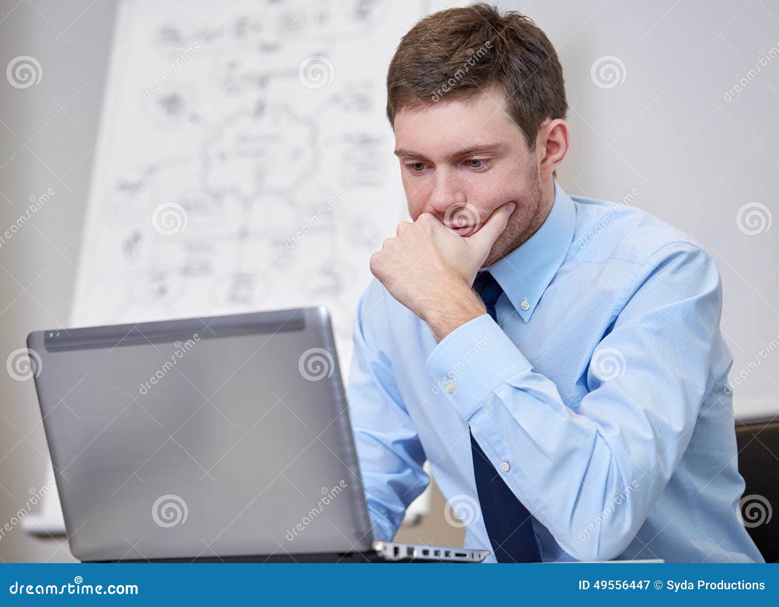 Businessman Sitting with Laptop in Office Stock Image - Image of ...