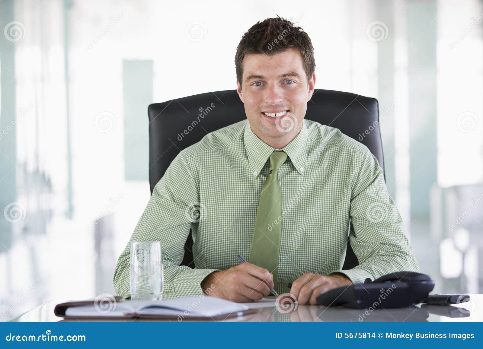 Businessman Sitting in Office Stock Photo - Image of caucasian ...