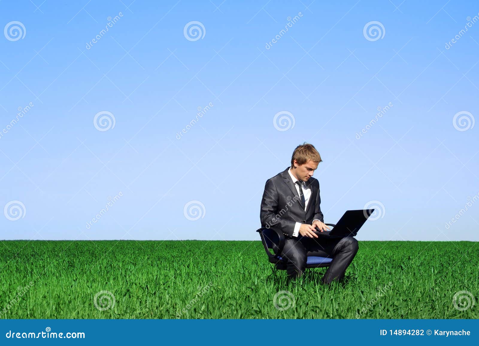 Businessman Sitting Outdoors with Laptop Computer Stock Photo - Image ...