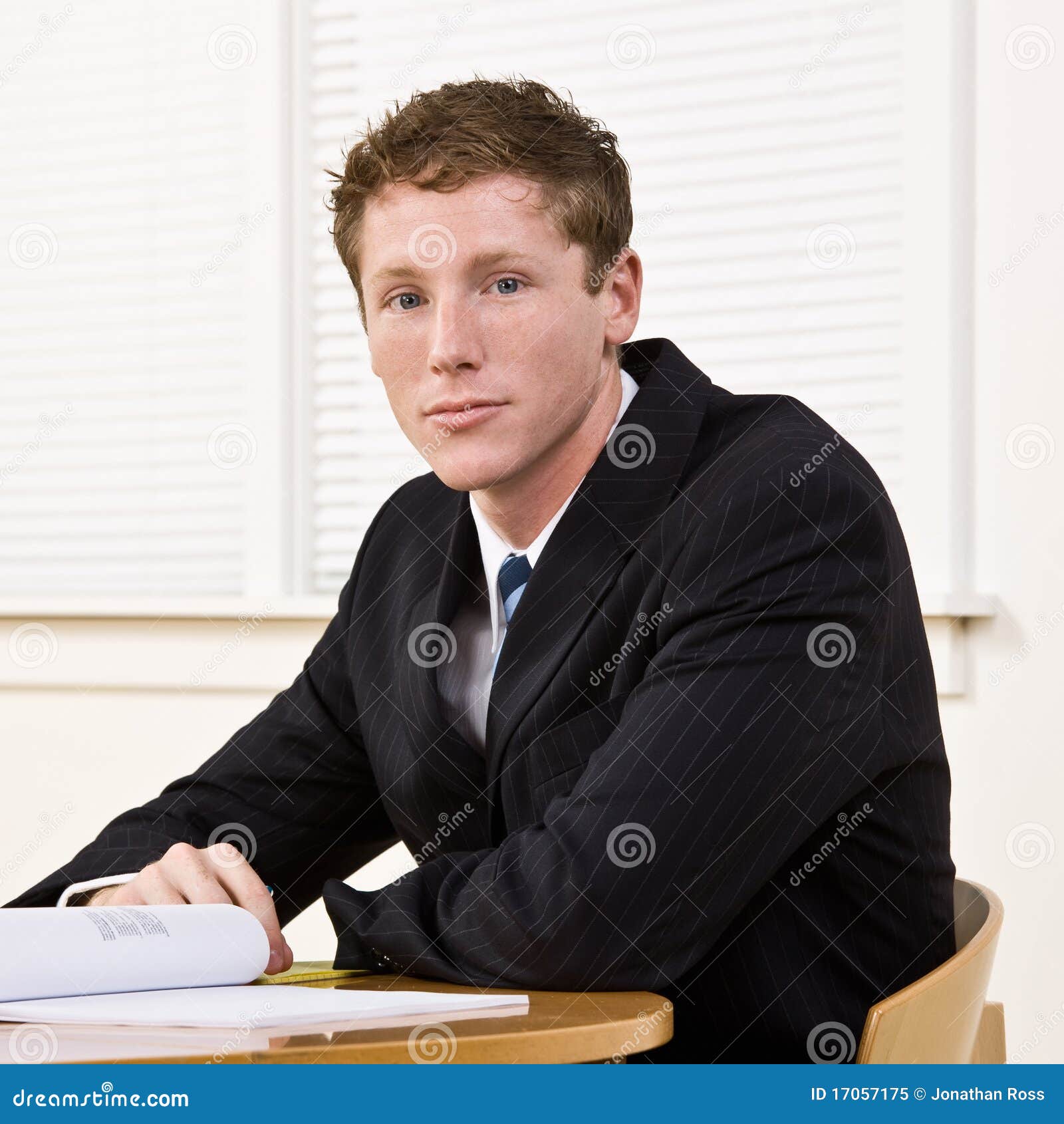 Businessman Sitting at Table Stock Image - Image of solemn, caucasian ...