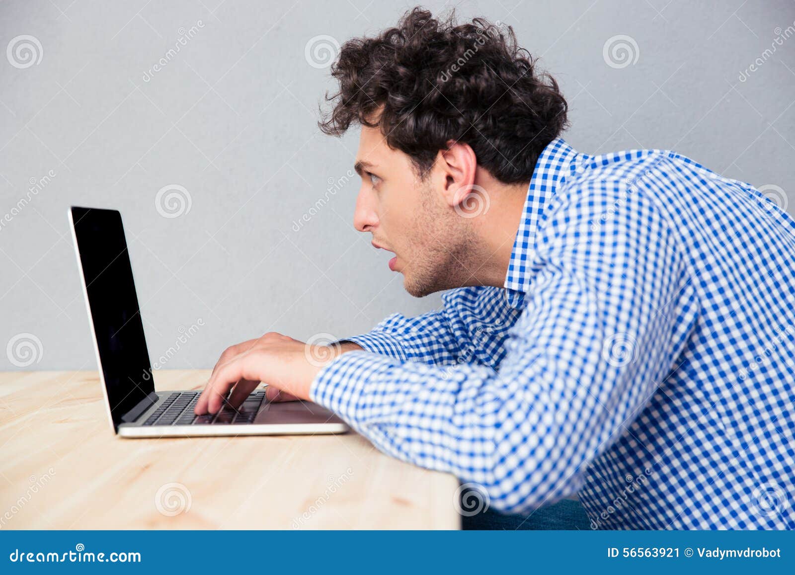 Businessman Sitting at the Table and Using Laptop Stock Image - Image ...
