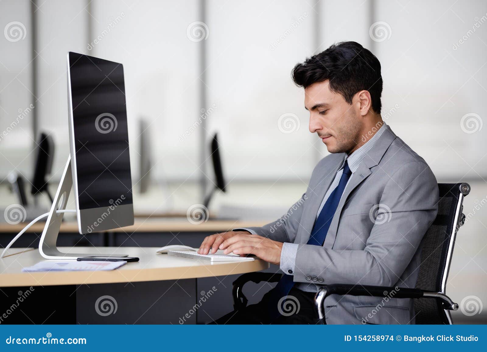Businessman Sitting and Using Computer Stock Photo - Image of casual ...