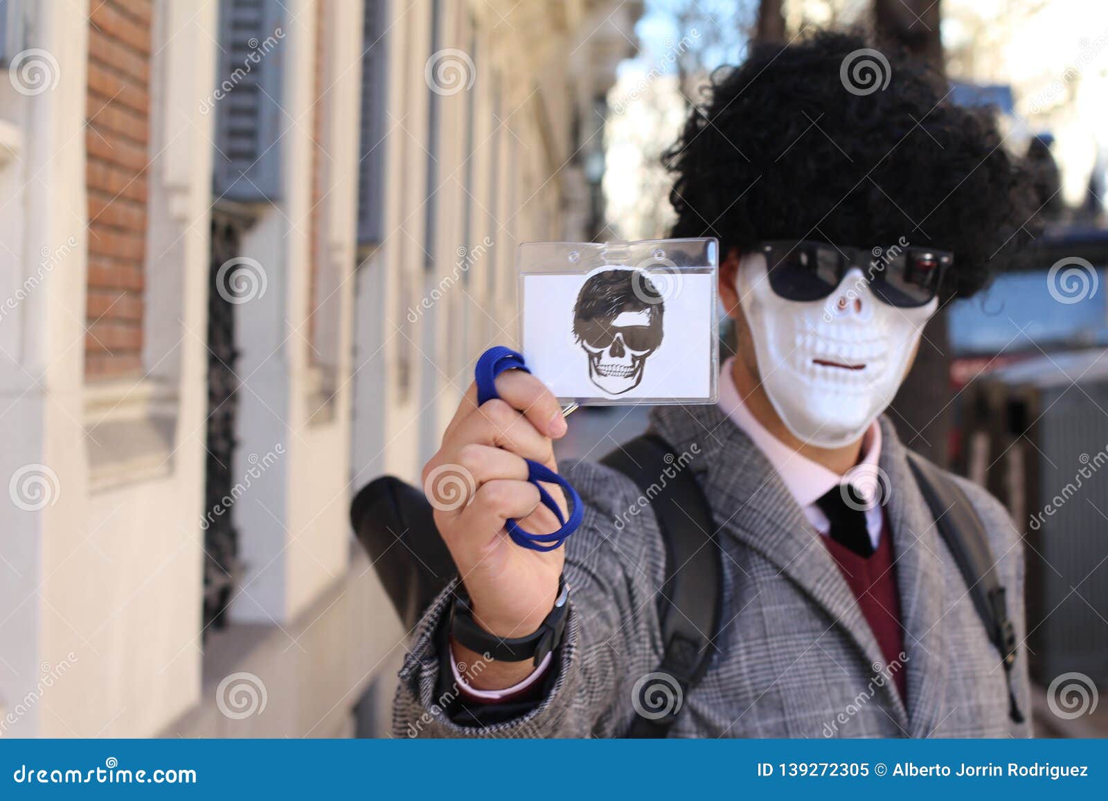 Businessman with Skeleton Face Showing ID Batch Stock Image - Image of ...