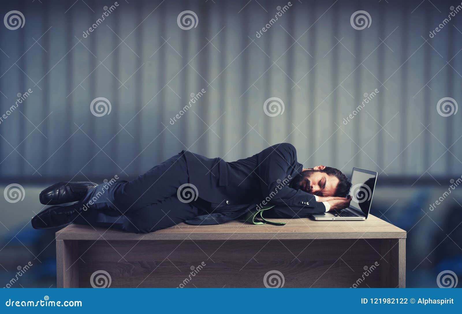 Businessman Sleeping Over a Desk Due To Overwork Stock Photo - Image of ...