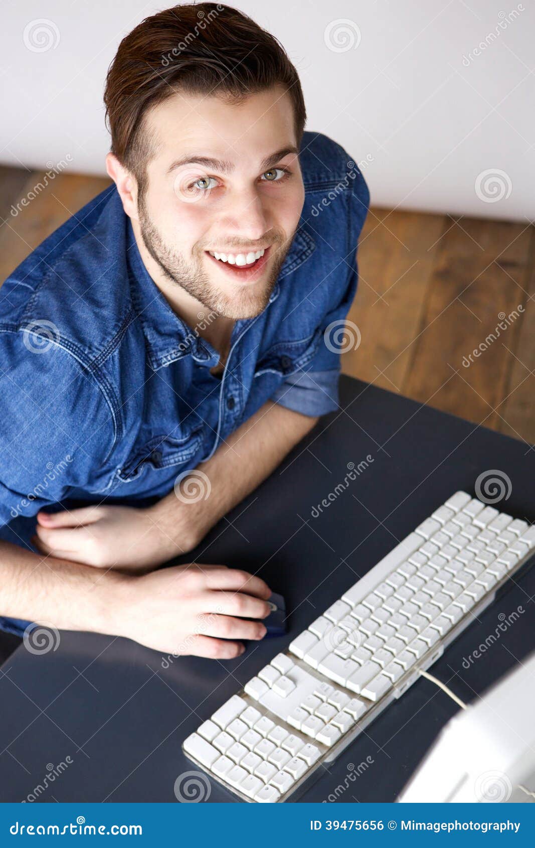 Businessman Smiling and Using Computer Stock Photo - Image of ...
