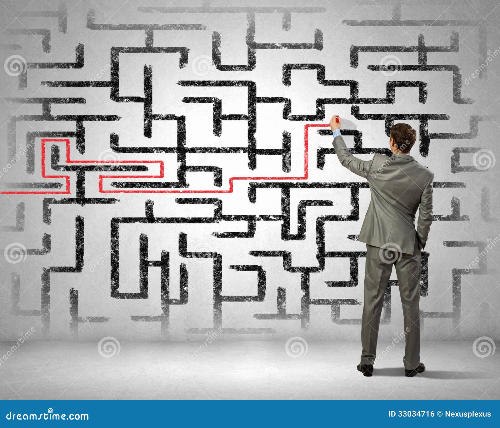 Businessman Solving Labyrinth Problem Stock Photo - Image: 33034716