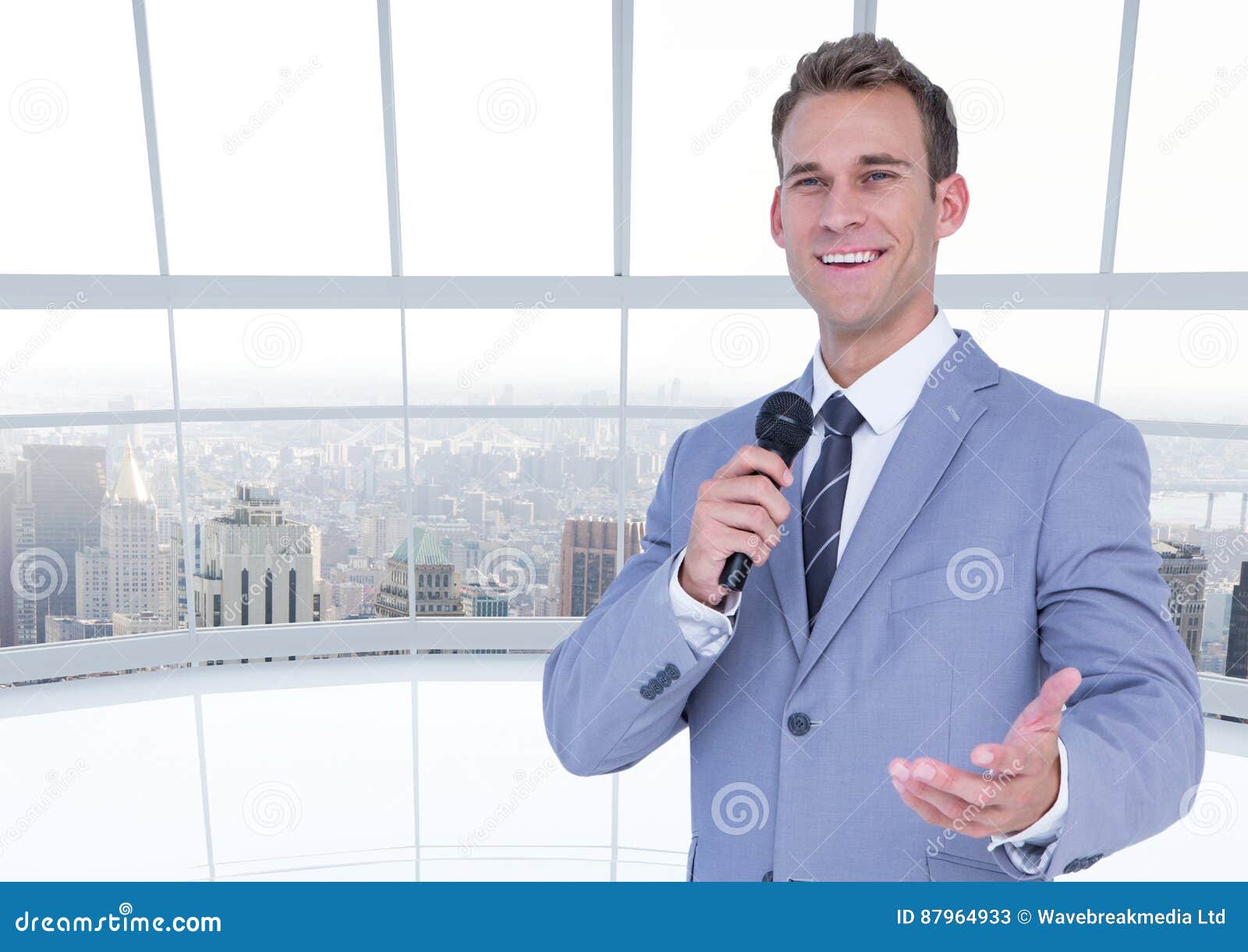 Businessman Speaking on Microphone Stock Image - Image of building ...