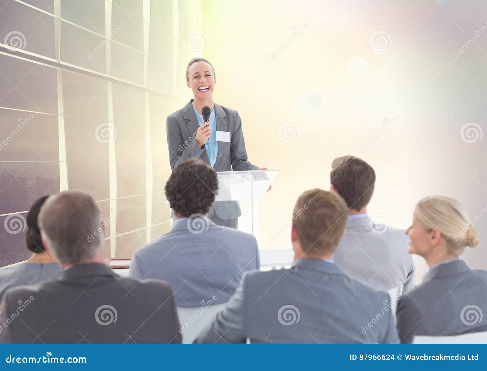 Businessman Speaking in Microphone at Meeting Stock Photo - Image of ...