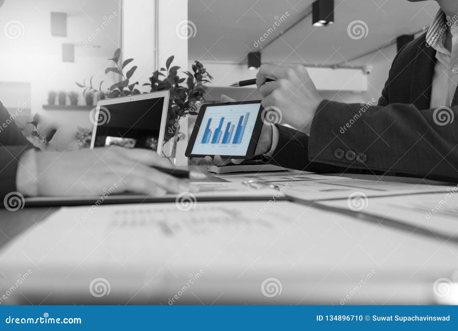 Businessman and Staff Working with Computer on Table Stock Photo ...