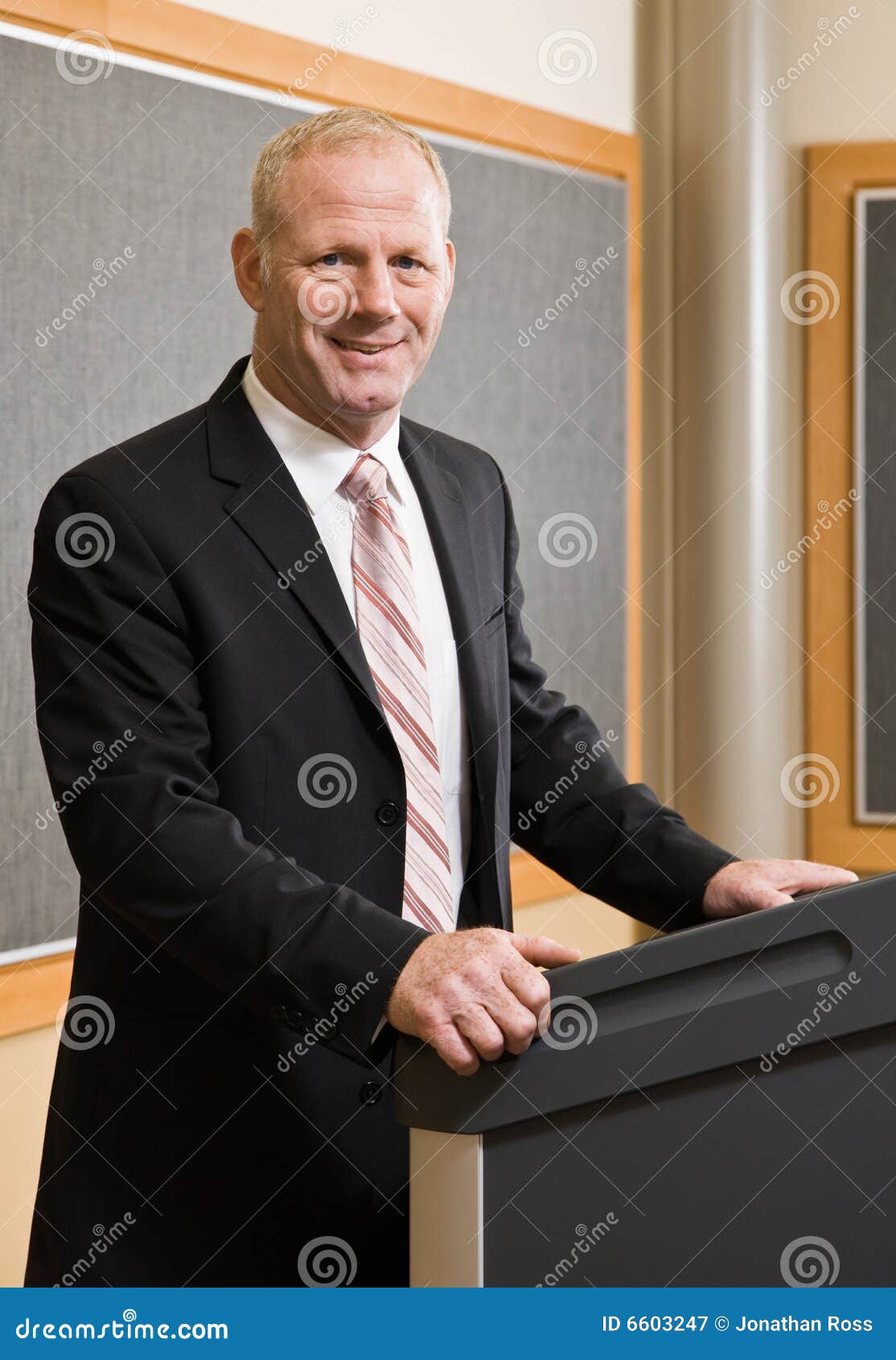 Businessman Standing Behind Podium Stock Image - Image of person ...